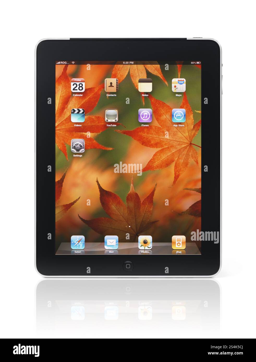 Apple iPad 3G tablet with desktop icons and autumn theme background on ...