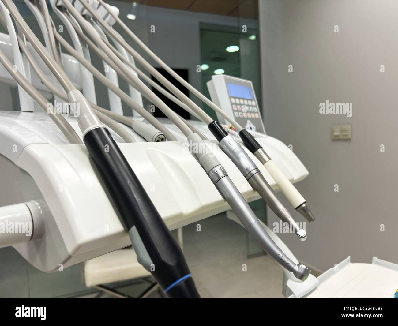 Dentist treating patients teeth instruments hi-res stock photography ...