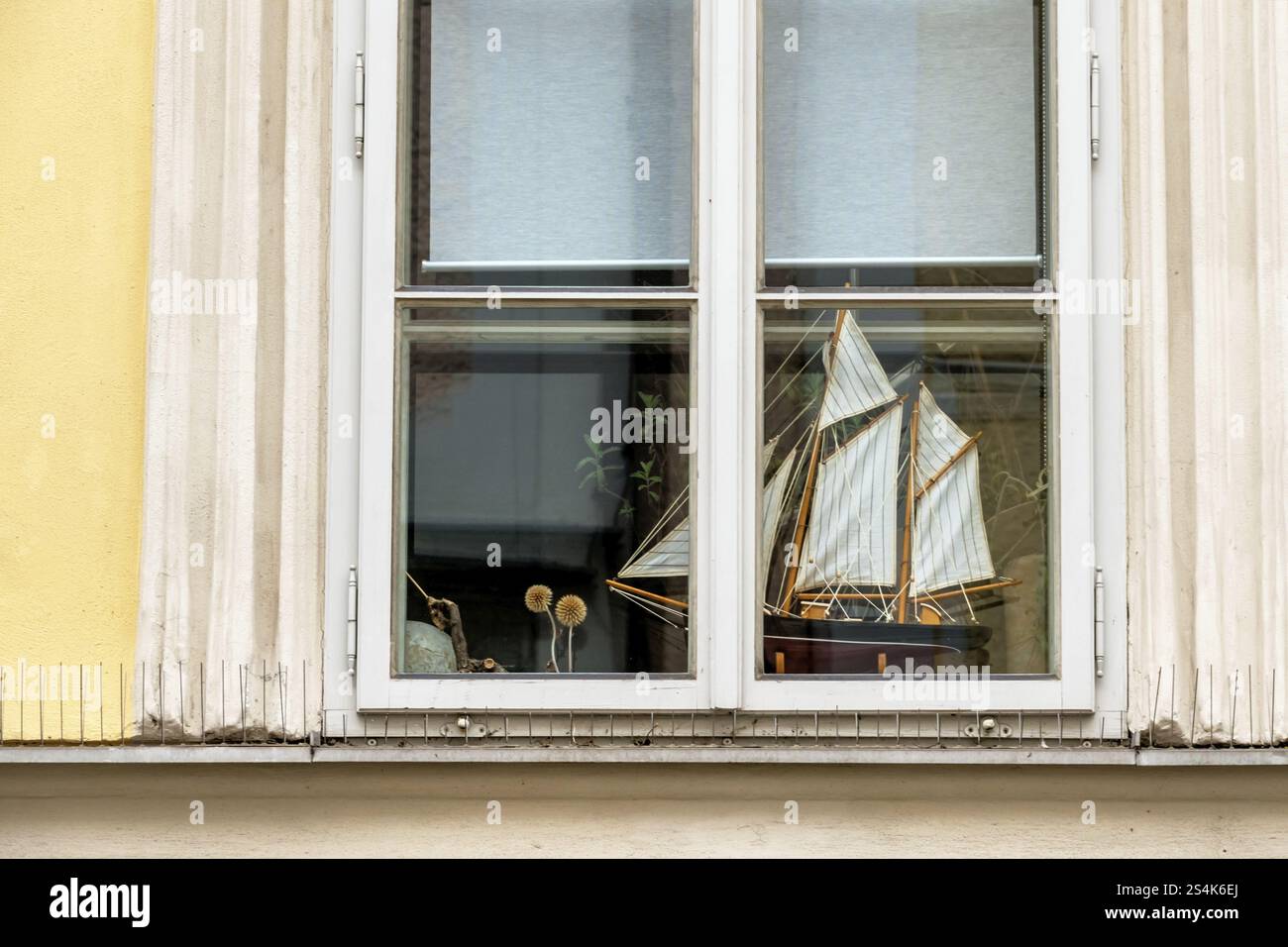 Ship model on the window sill, symbol for travelling, sailing ...