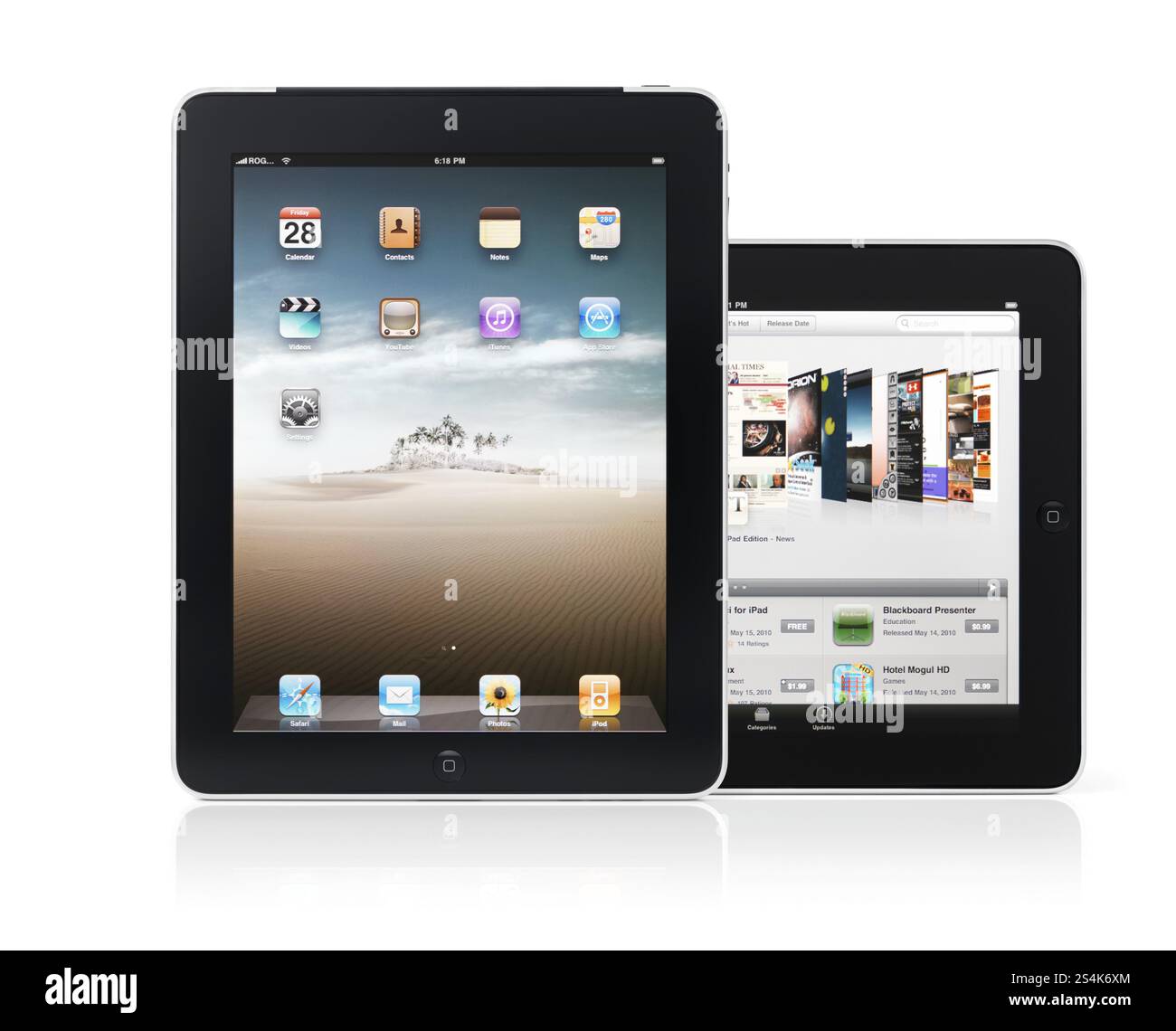 Two Apple iPad 3G tablets isolated on white background with clipping ...