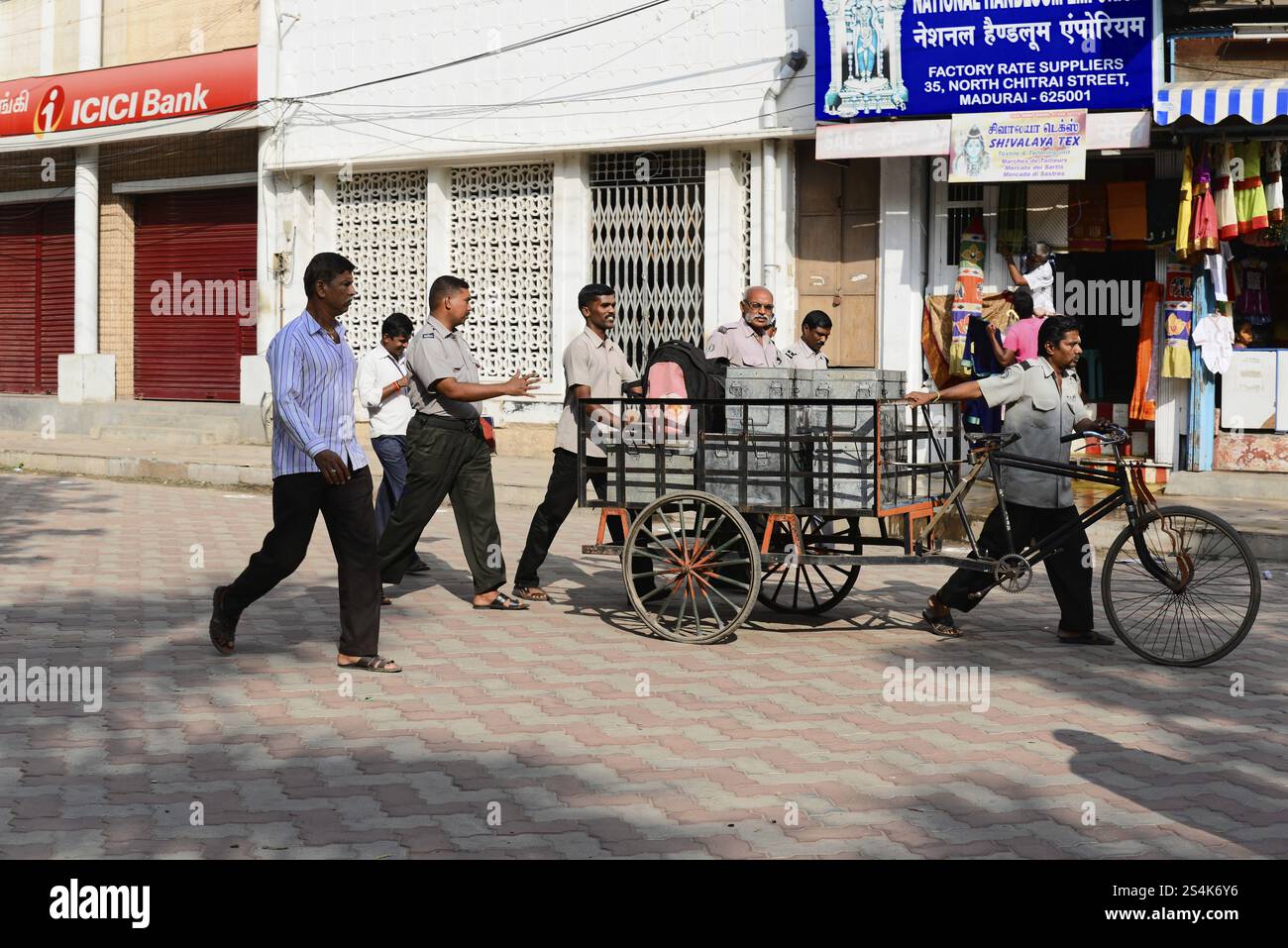 Cash transport, Madurai, South India, India, Asia, men pulling a cart ...