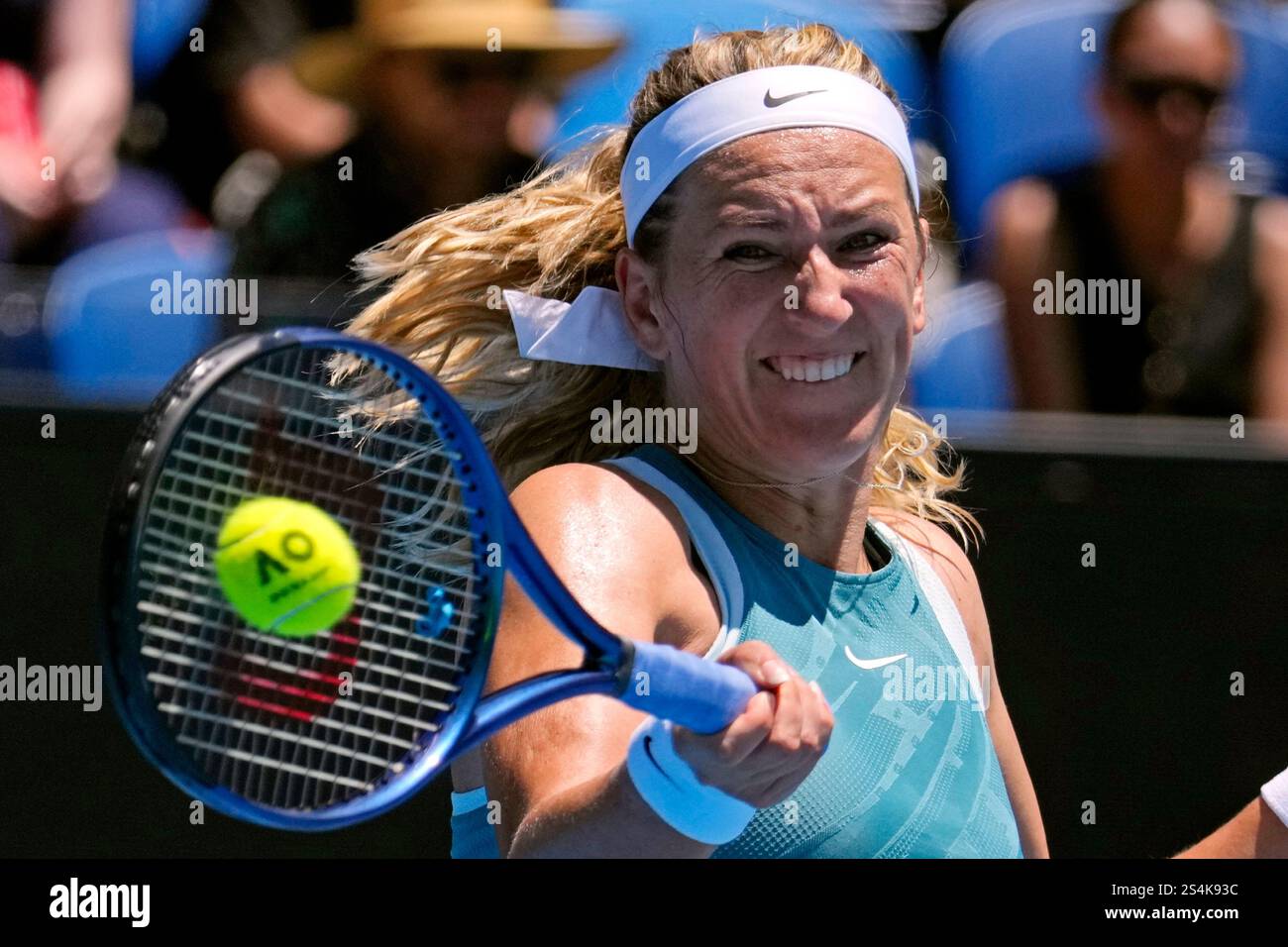 Victoria Azarenka of Belarus plays a forehand return to Lucia Bronzetti ...