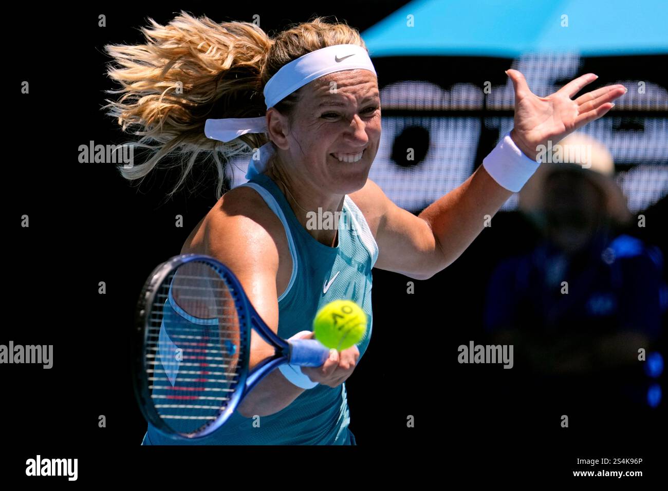 Victoria Azarenka of Belarus plays a forehand return to Lucia Bronzetti ...