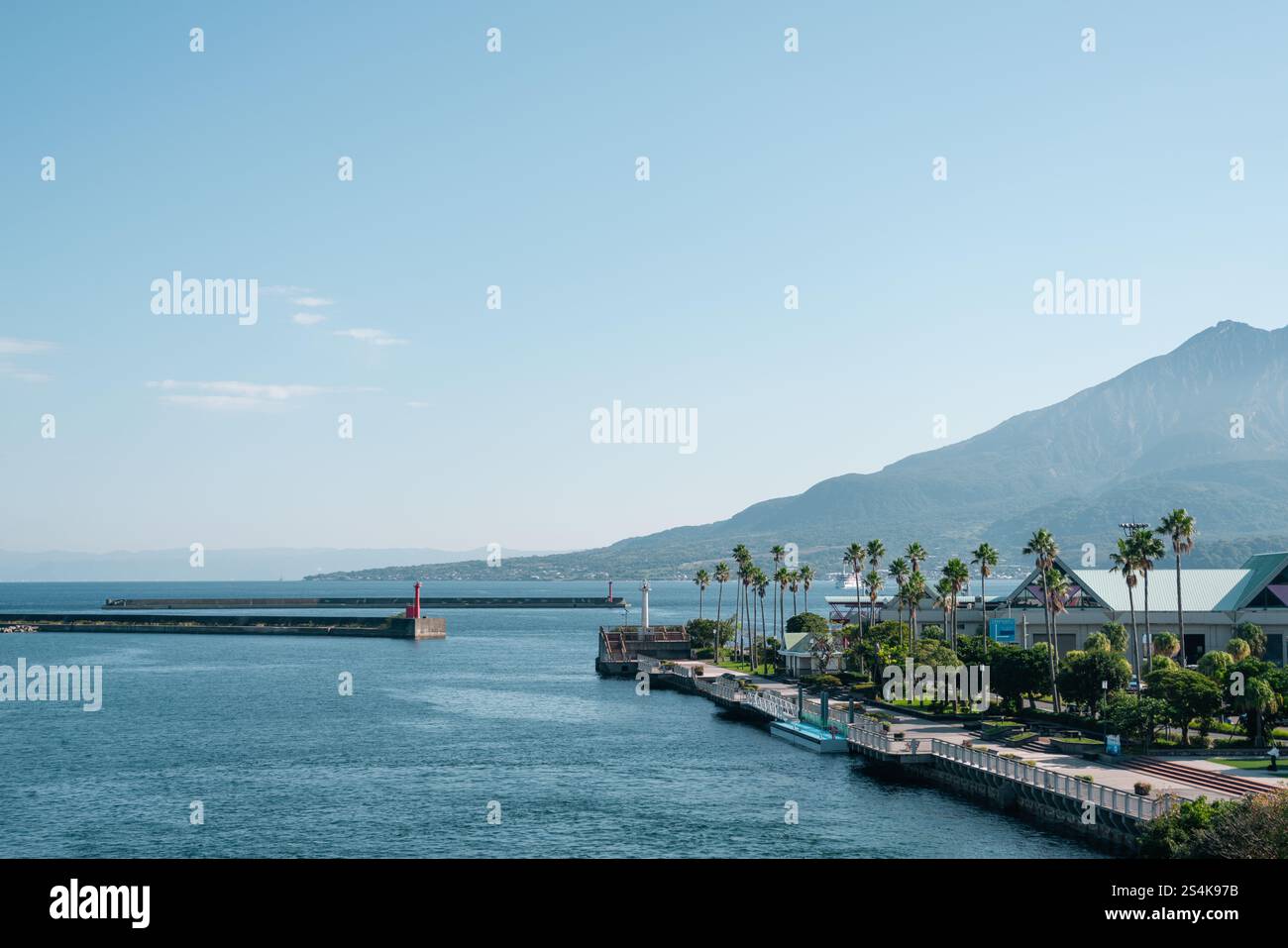 View of Kagoshima harbor and Sakurajima volcano island in Kagoshima ...