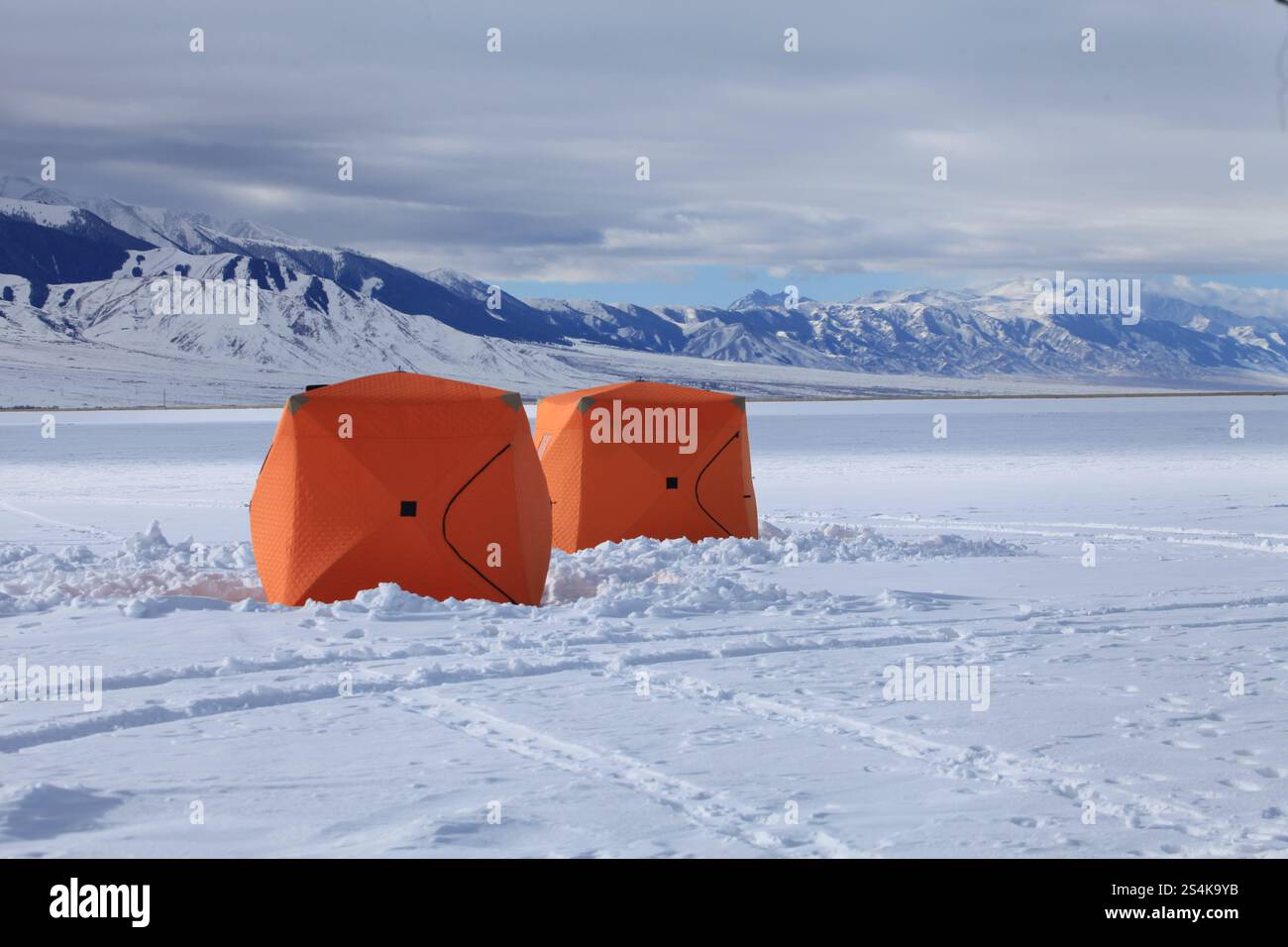 BARKOL, CHINA - JANUARY 12, 2025 - Camping tents are seen in a snowy ...