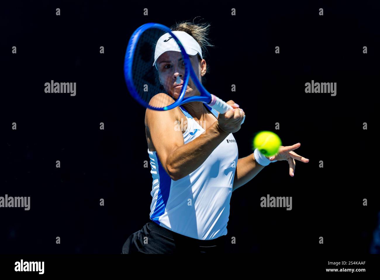 MELBOURNE, VIC - JANUARY 13: Magda Linette of Poland in action during ...