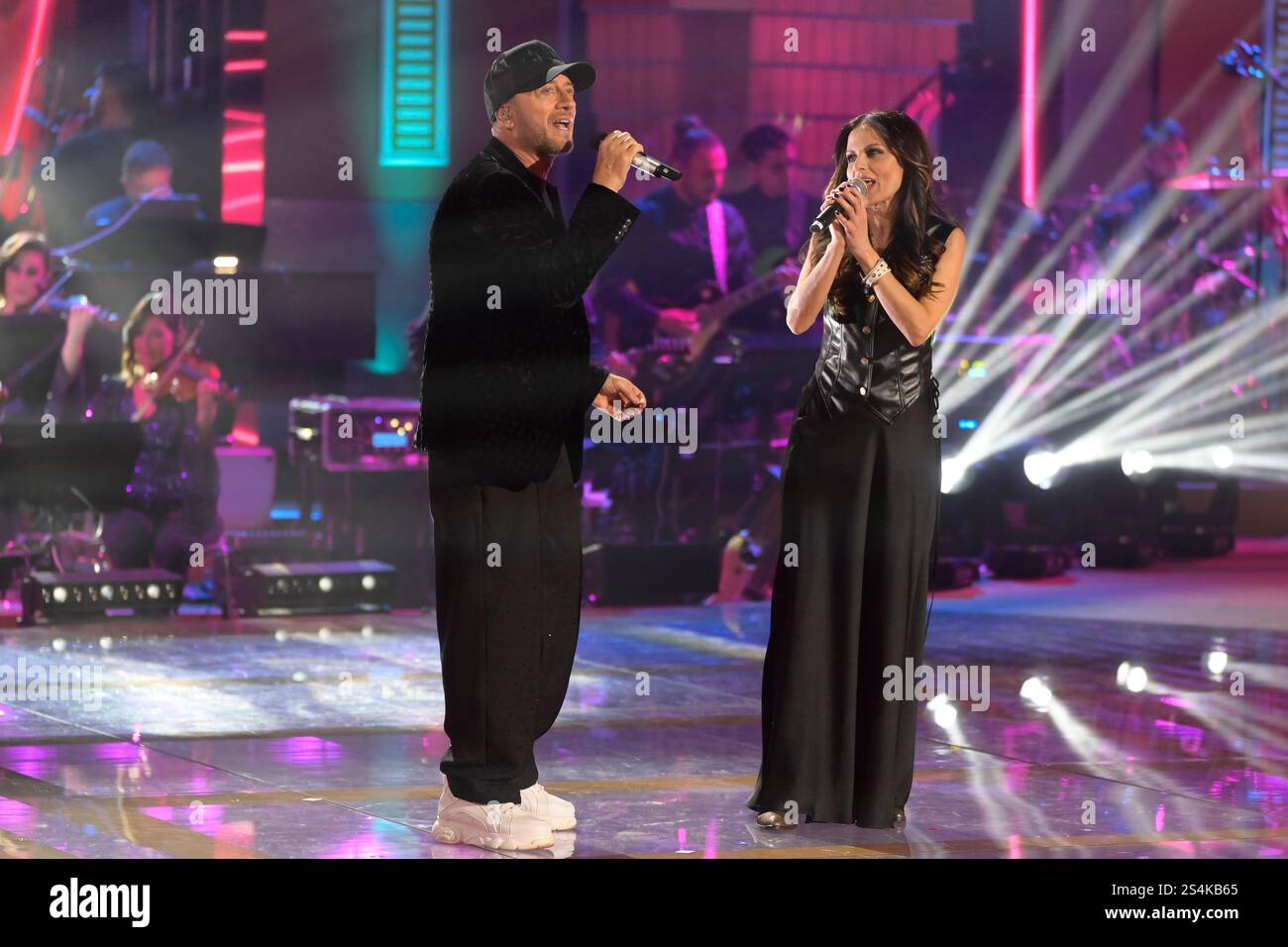 Raffaele Riefoli, well known as Raf (l) and Antonella Bucci (r) perform ...