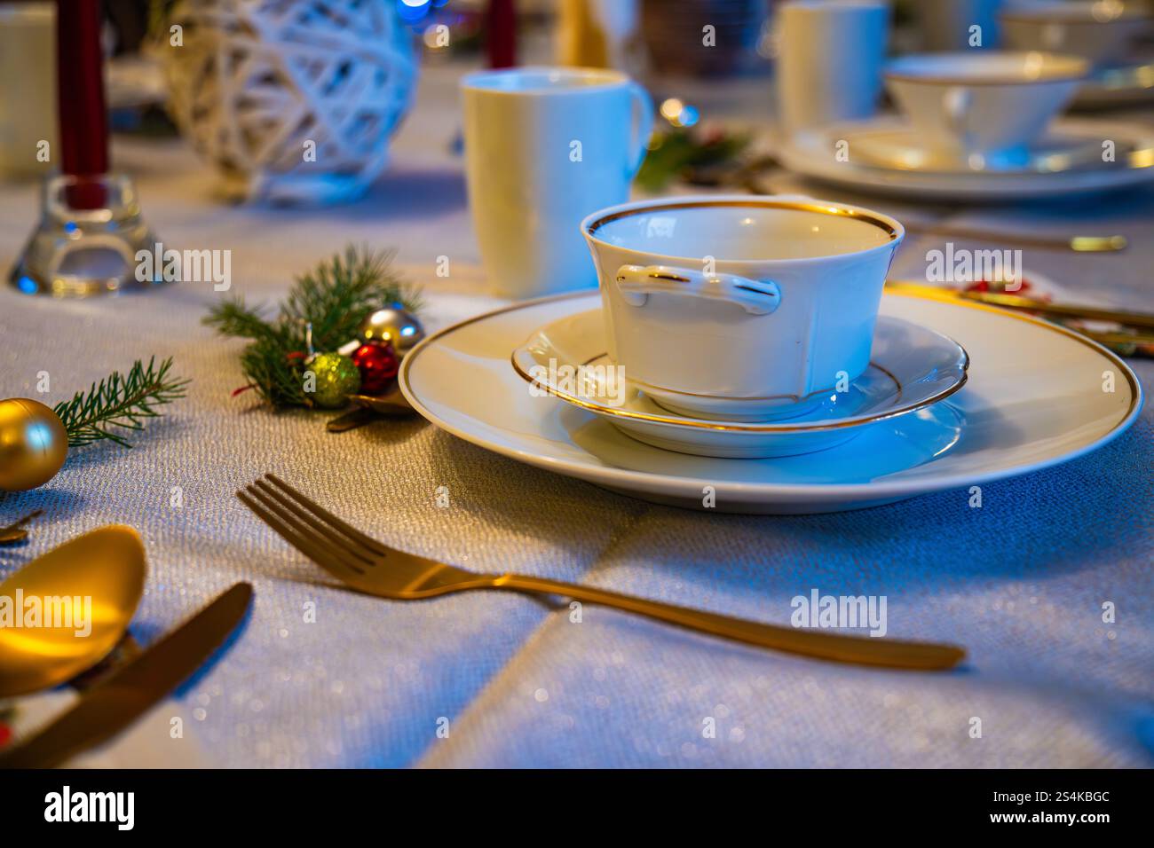 Elegant Christmas Eve table setup with festive decorations and seasonal ...