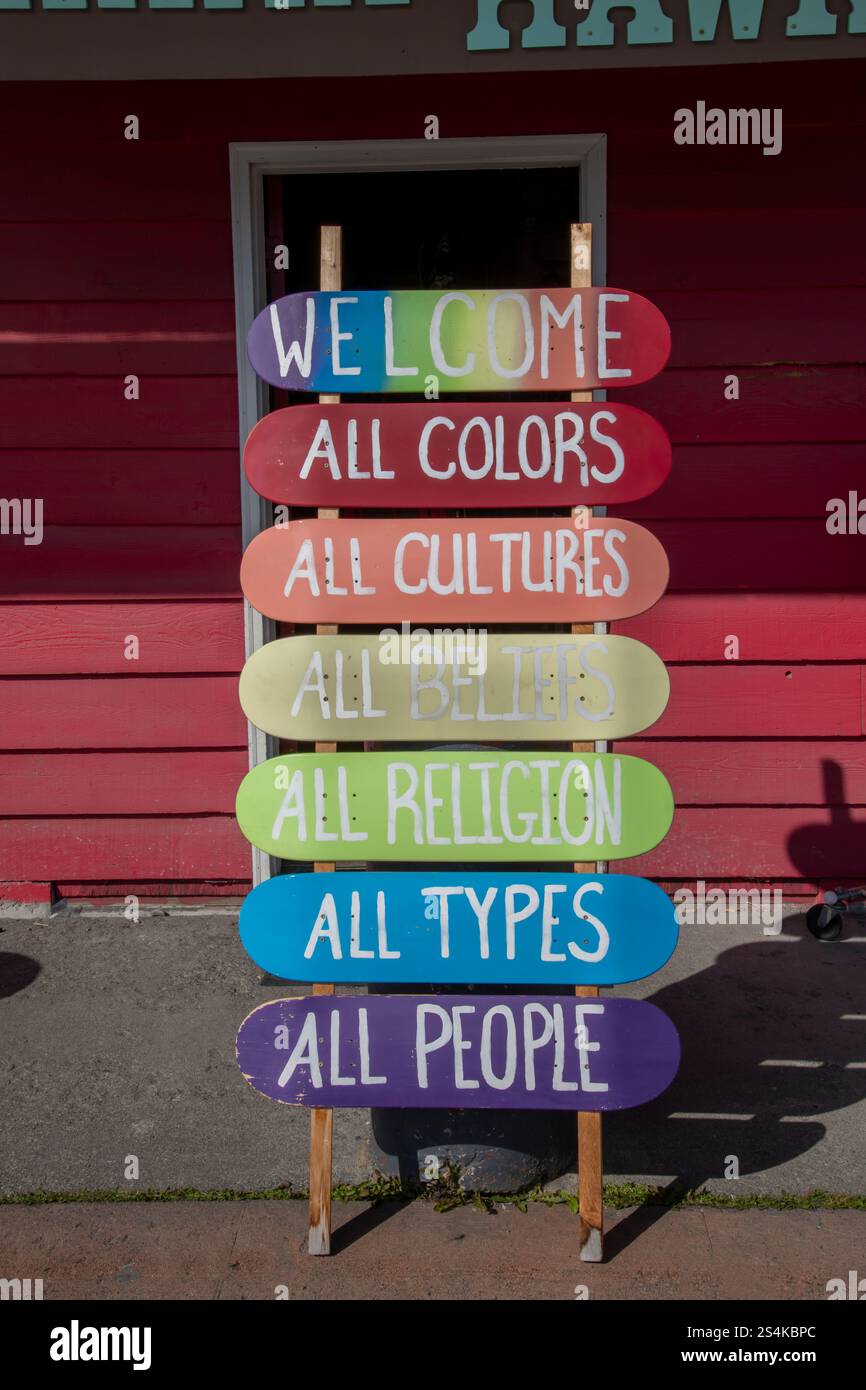 Valdez, Alaska. Business displaying a welcome all sign Stock Photo - Alamy