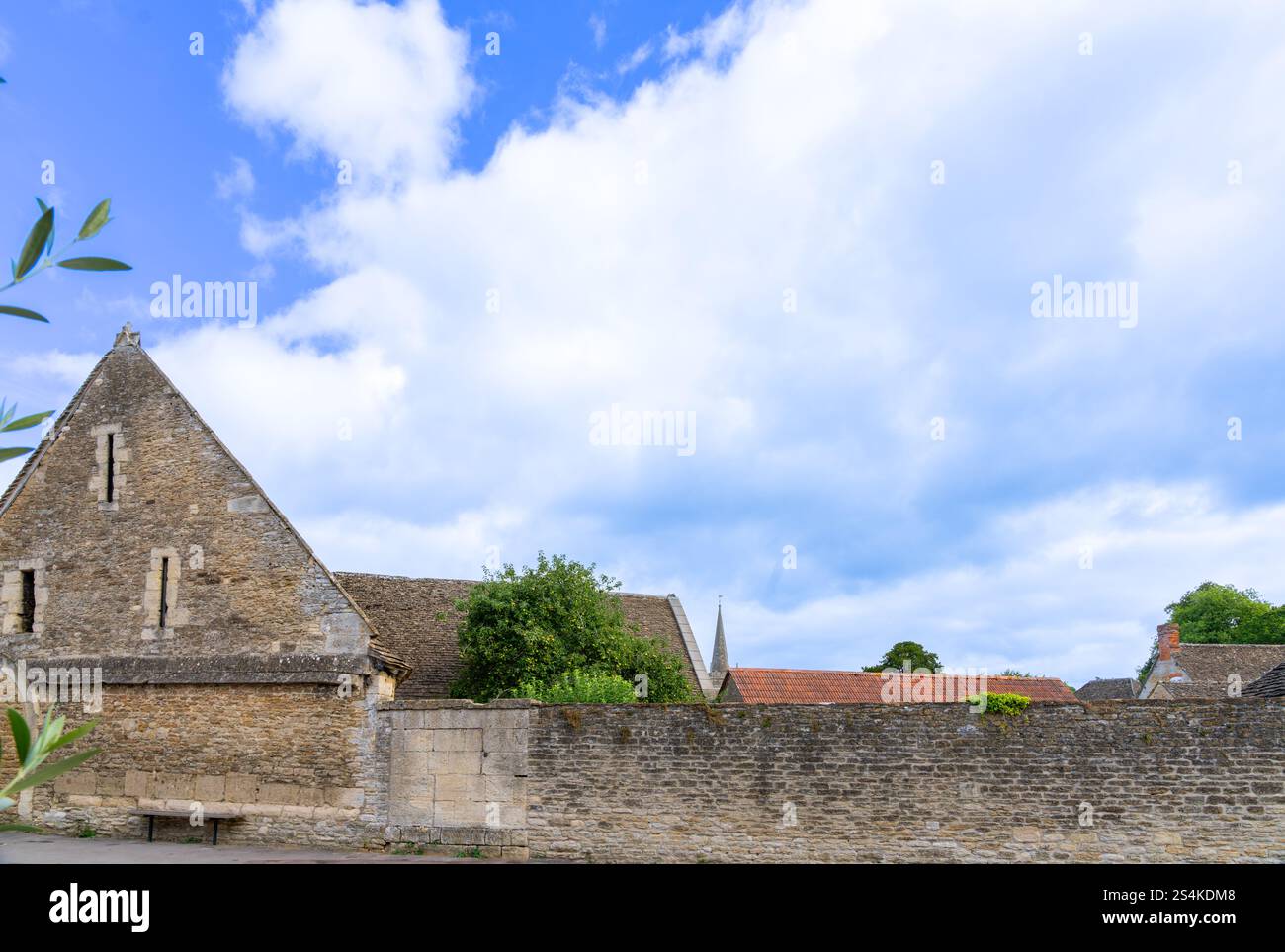 Heritage medieval building roof and wall of stone with slate roof in ...
