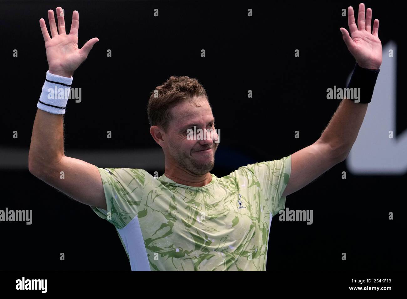 James Duckworth of Australia reacts after defeating Dominic Stricker of Switzerland in their ...
