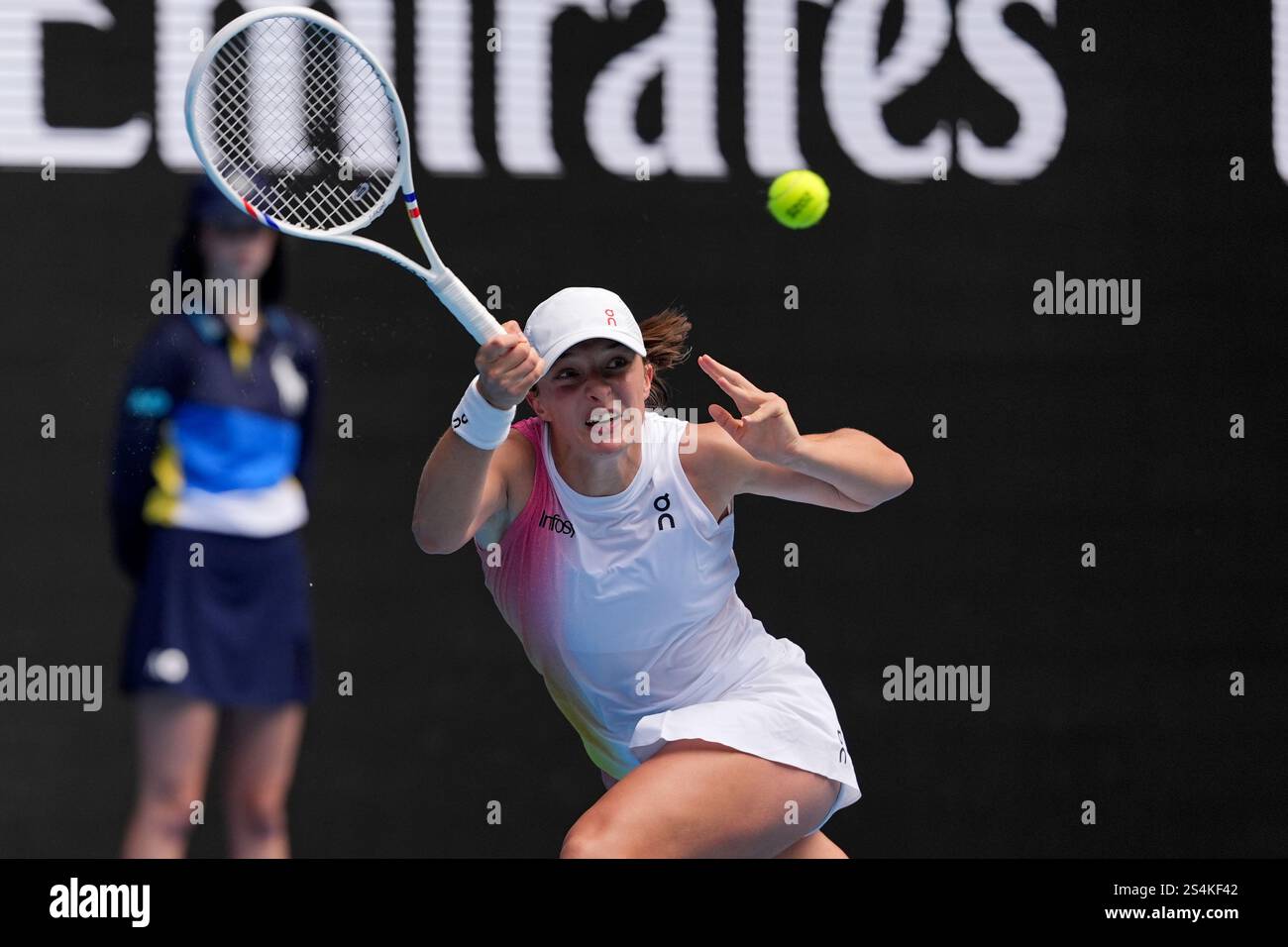 Iga Swiatek of Poland plays a forehand return to Katerina Siniakova of ...