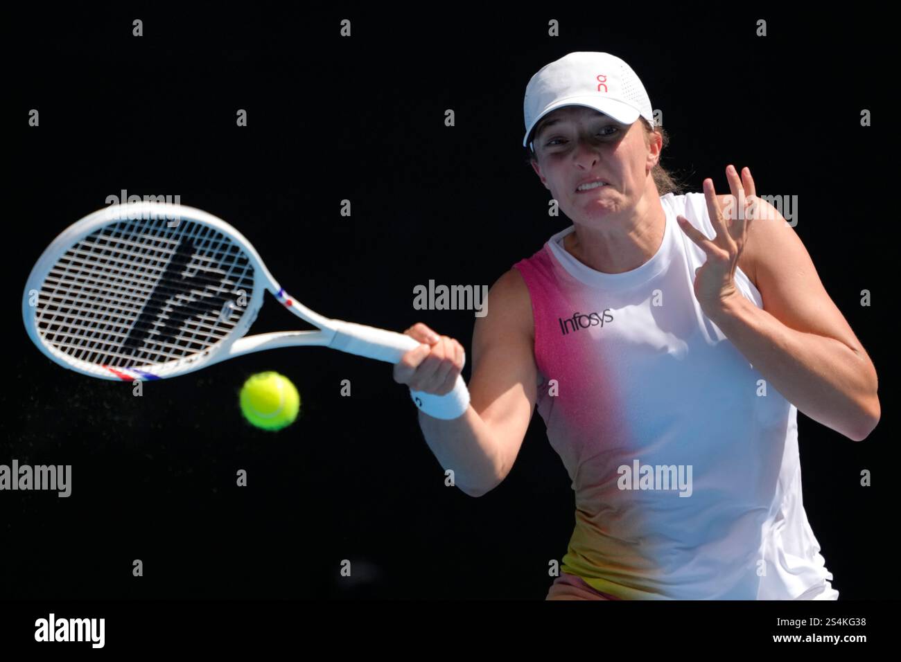 Iga Swiatek of Poland plays a forehand return to Katerina Siniakova of ...