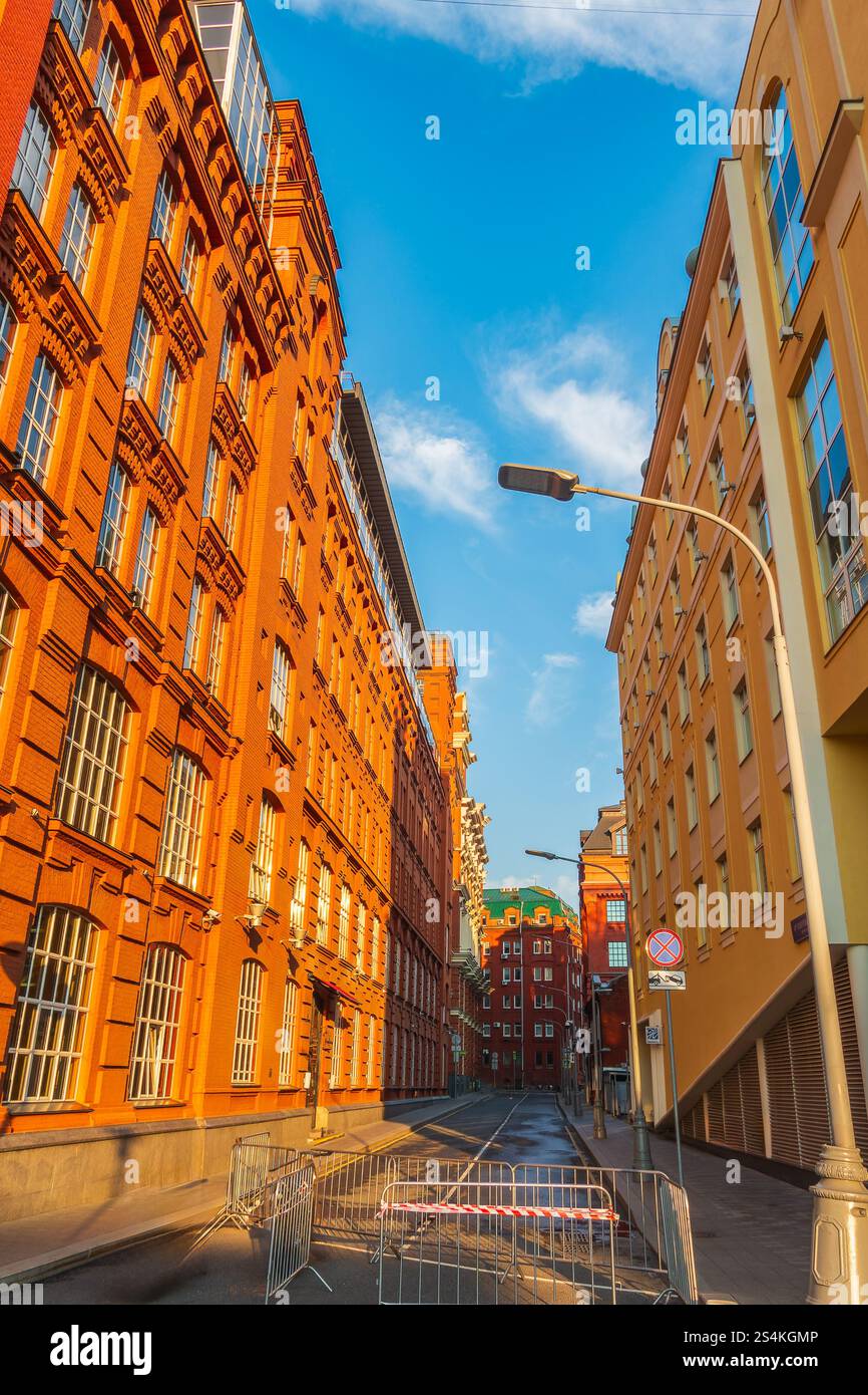4 th Golutvinsky Lane, brick building with large white windows. Narrow ...