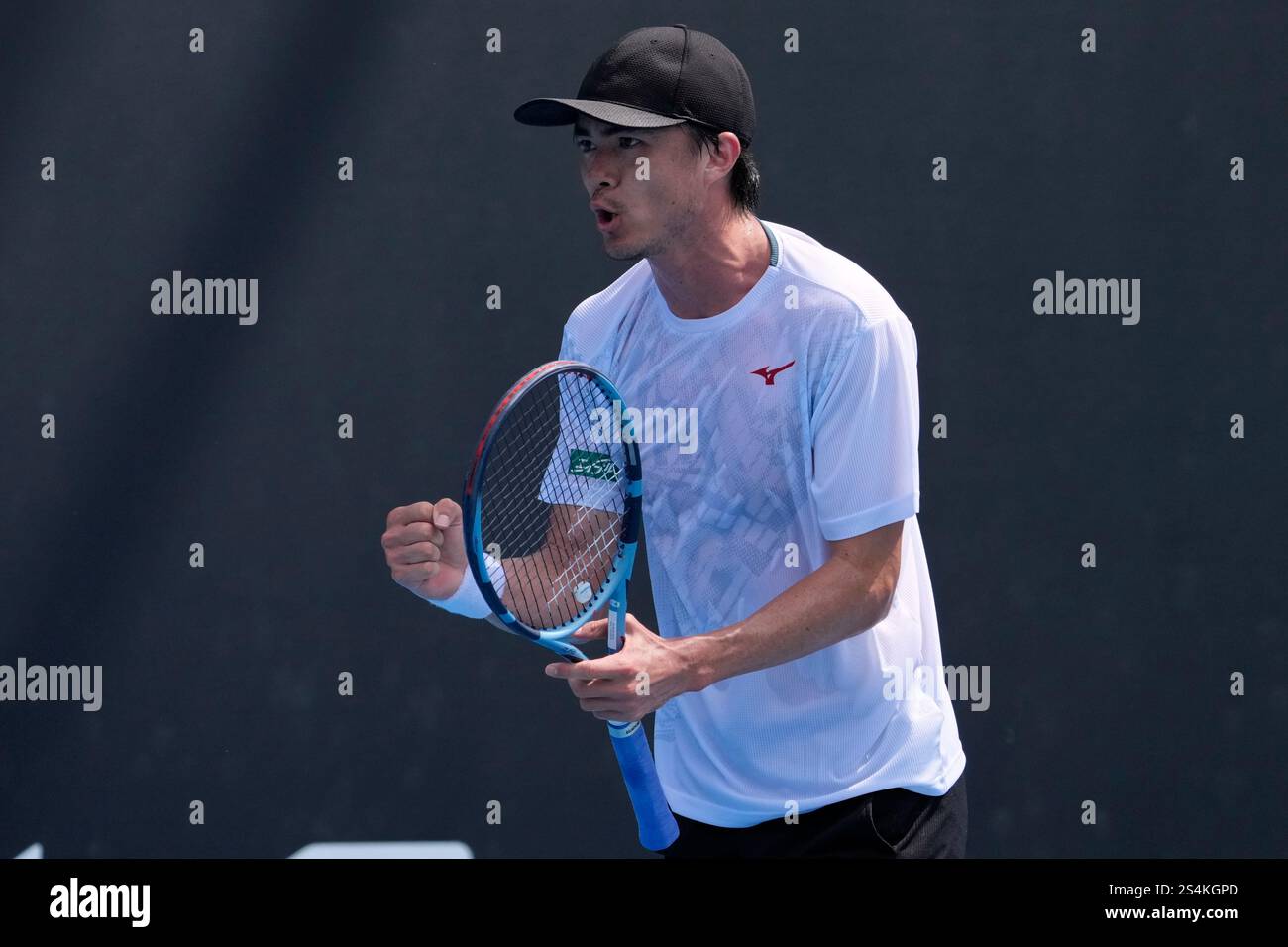 Taro Daniel of Japan reacts aftre winning a point against Tristan ...