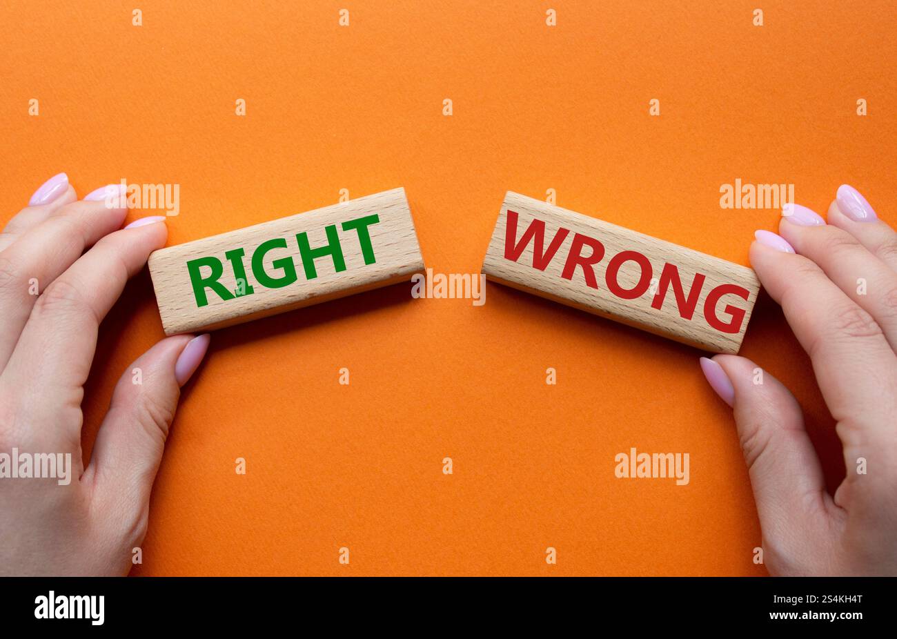 Right or Wrong symbol. Concept word Right or Wrong on wooden blocks ...