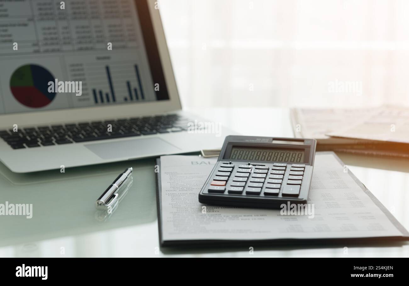 Financial accounting concept. Calculator on business earning report ...