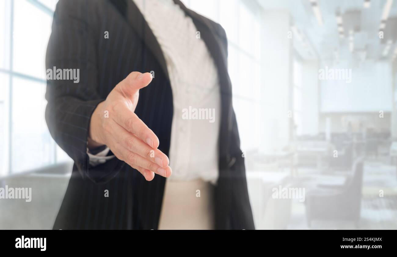 Business women giving her hand for handshake to partner. Concept of ...