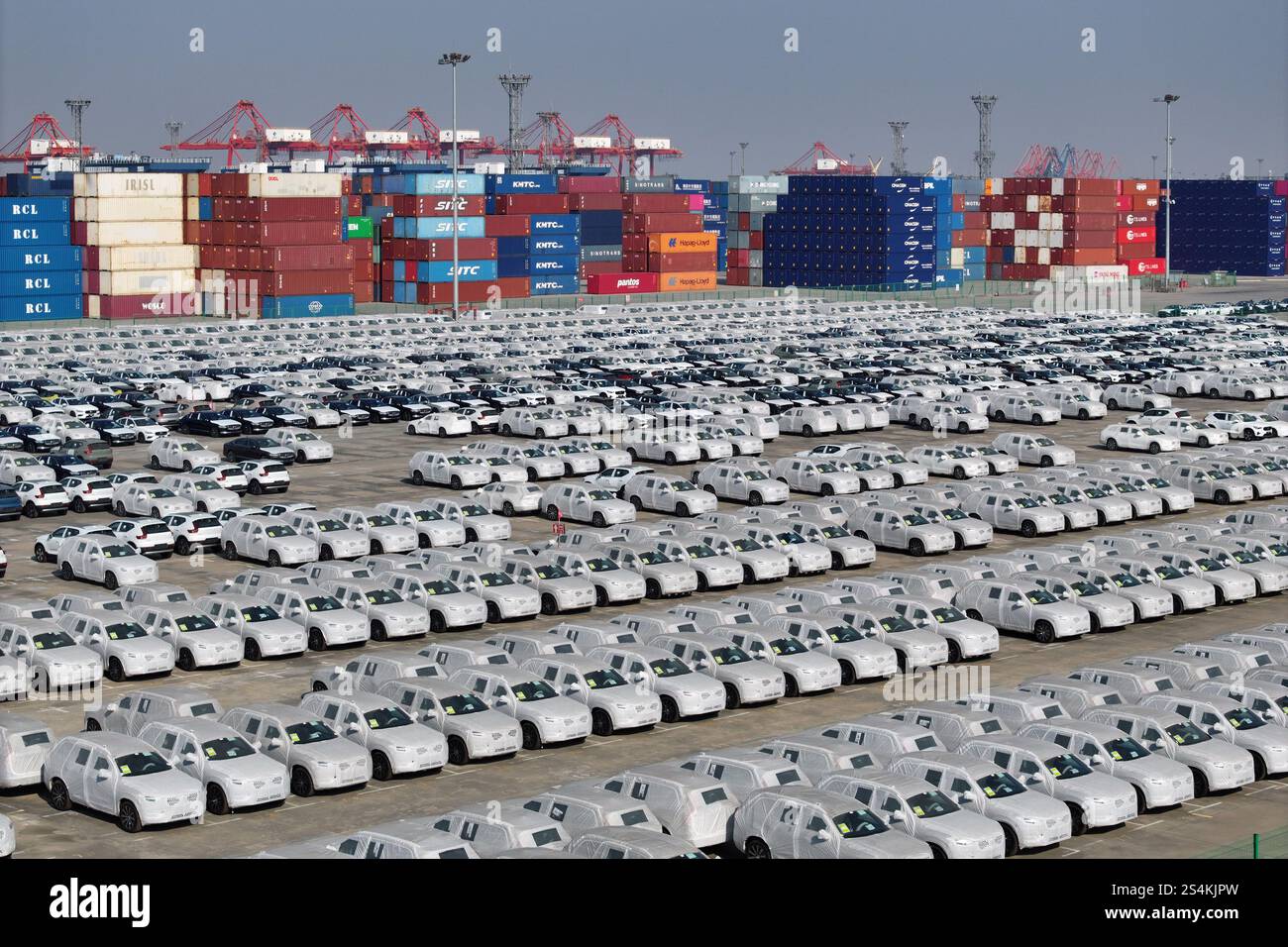 NANJING, CHINA - JANUARY 13, 2025 - Volvo cars waiting for transfer are ...