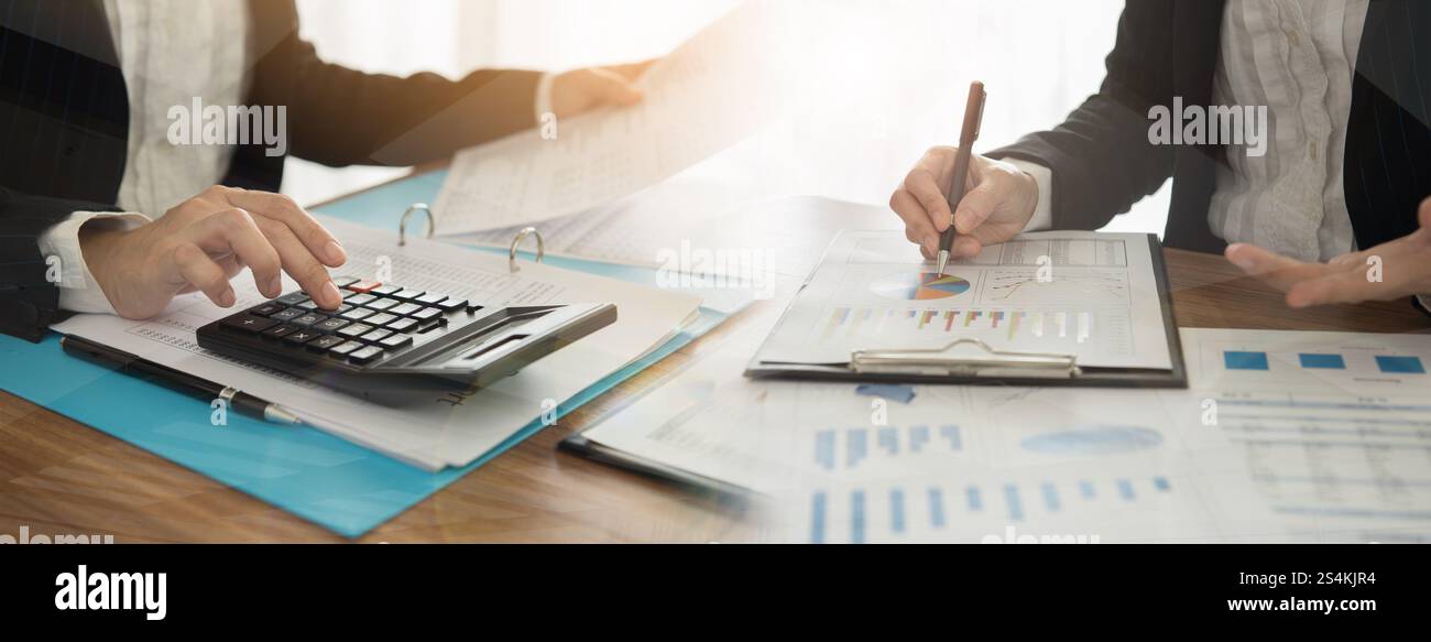 Auditor team calculating checking hi-res stock photography and images ...