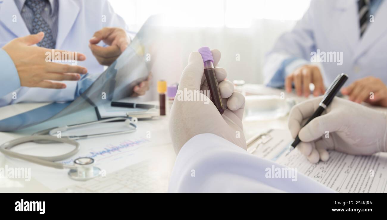 Medical test, Blood sample in tube with team doctors diagnose for ...