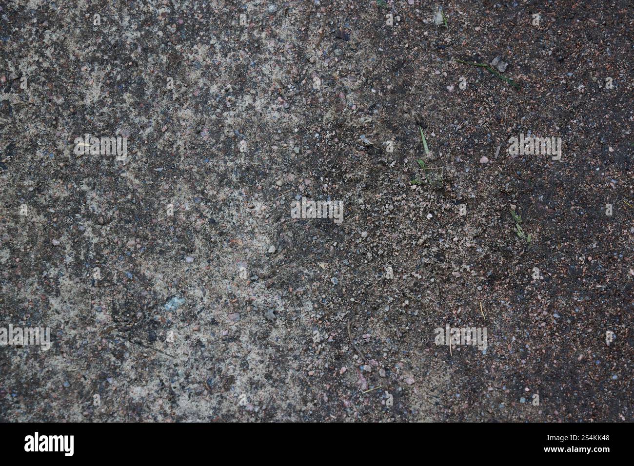 Textured Surface of Ground Featuring Distinct Dark and Light Variations ...