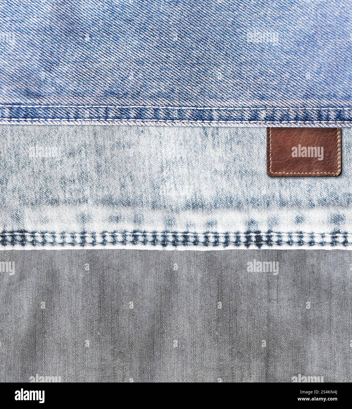 Vertical background with blue and gray denim texture with a seam and ...