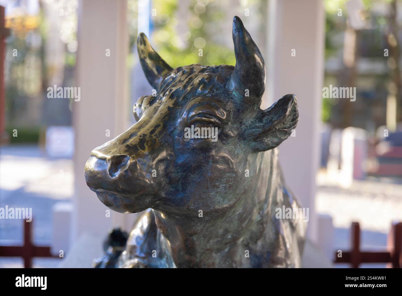 A guardian statue of cow at Kameido Tenjin shrine closeup Stock Photo ...