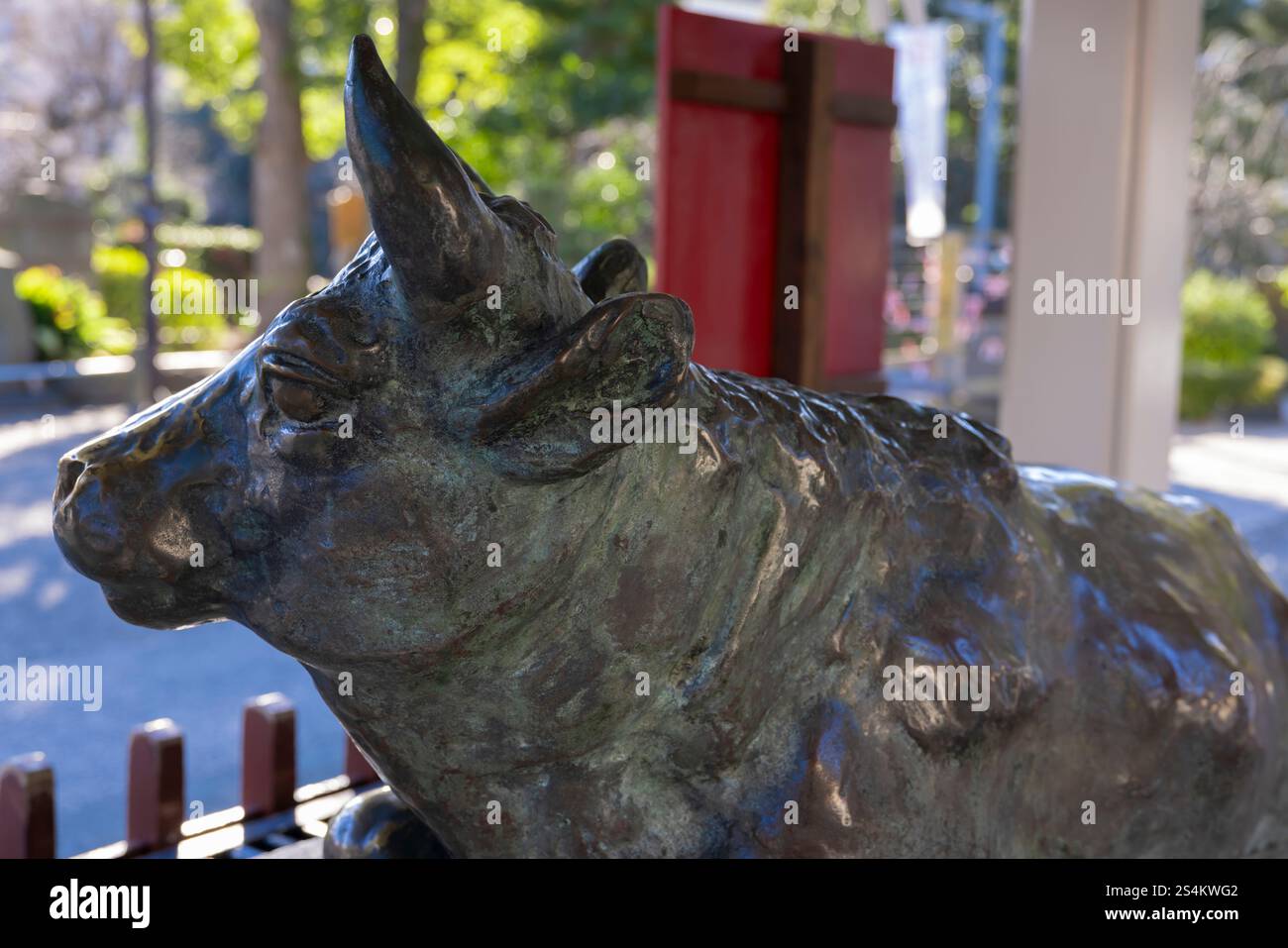 A guardian statue of cow at Kameido Tenjin shrine closeup Stock Photo ...