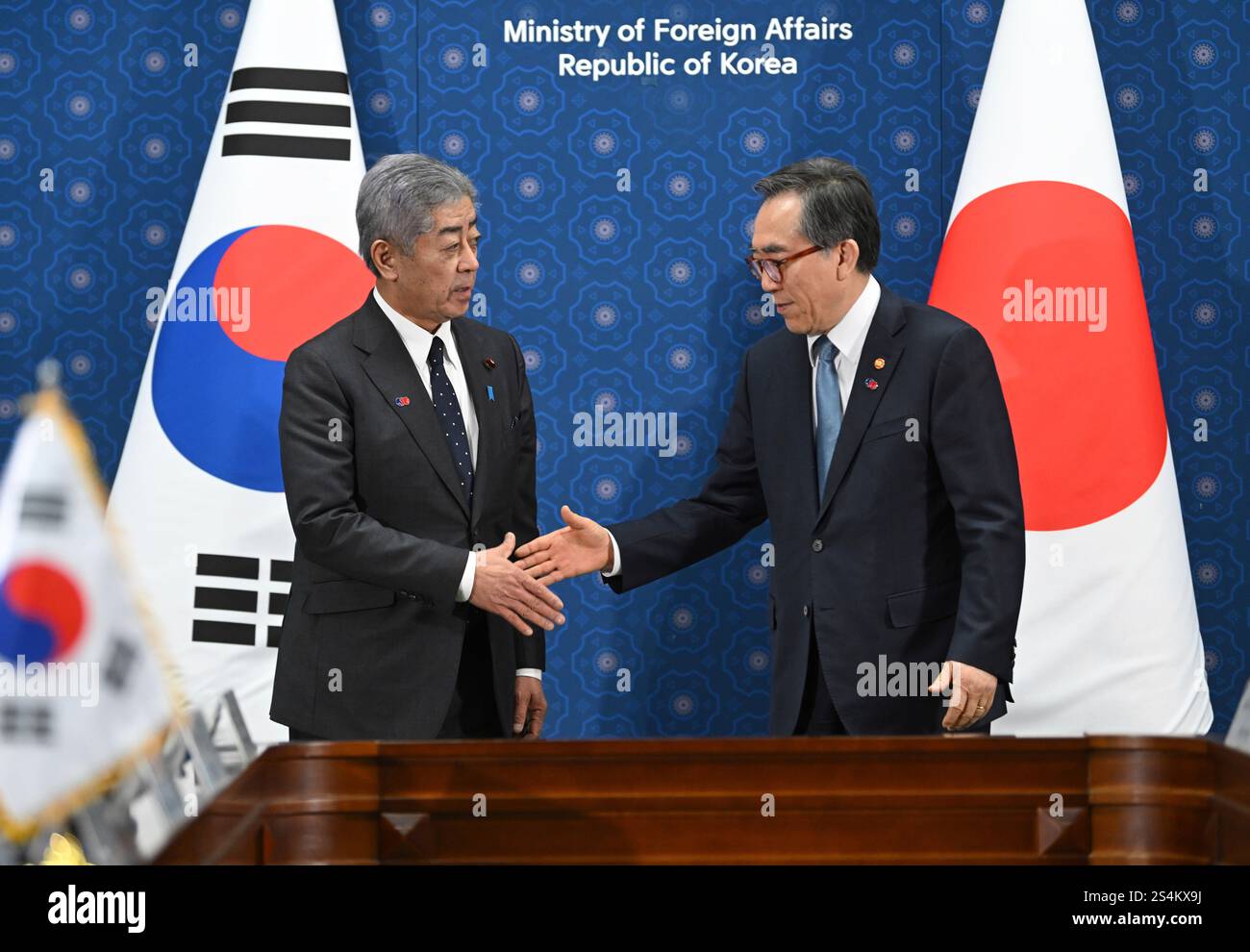 South Korean Foreign Minister Cho Tae-yul, right, shakes hands with ...