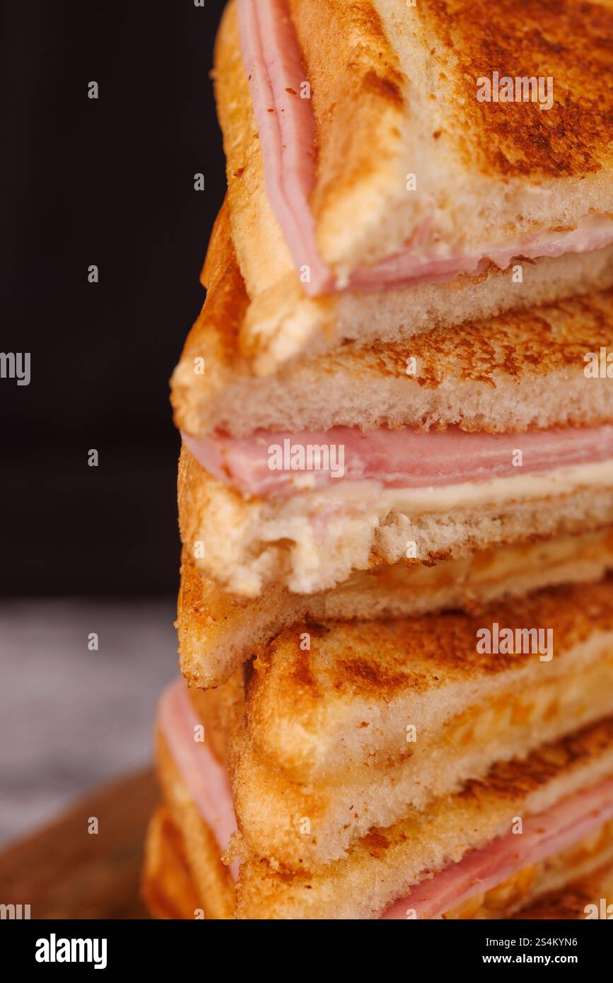 A delicious arrangement of ham and cheese sandwiches cut in half ...