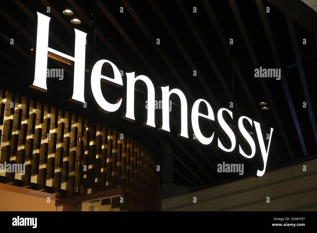 Hennessy brand logo store sign Stock Photo - Alamy