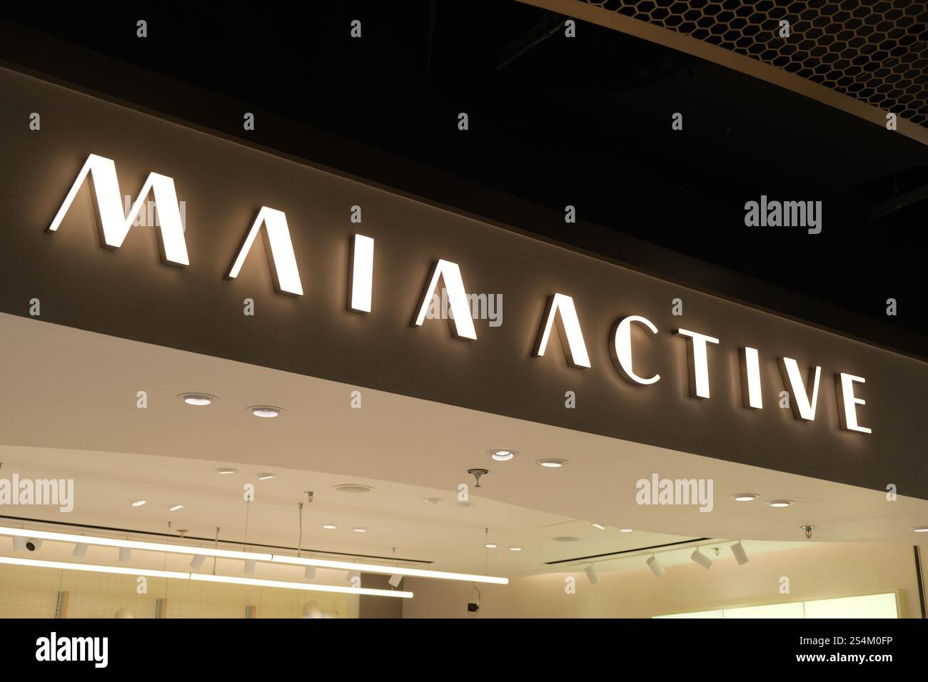 Maia active brand logo store sign Stock Photo - Alamy