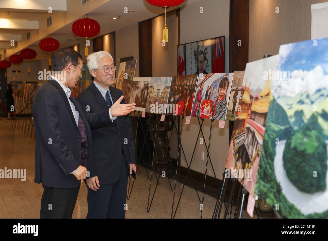 Toronto, Canada.10th January 2025. Attendees visit the photo exhibition ...