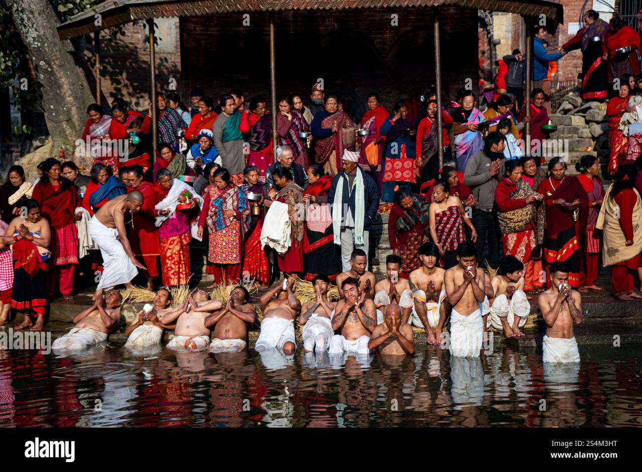 Kathmandu, Kathmandu, Nepal. 13th Jan, 2025. Devotees immerse ...