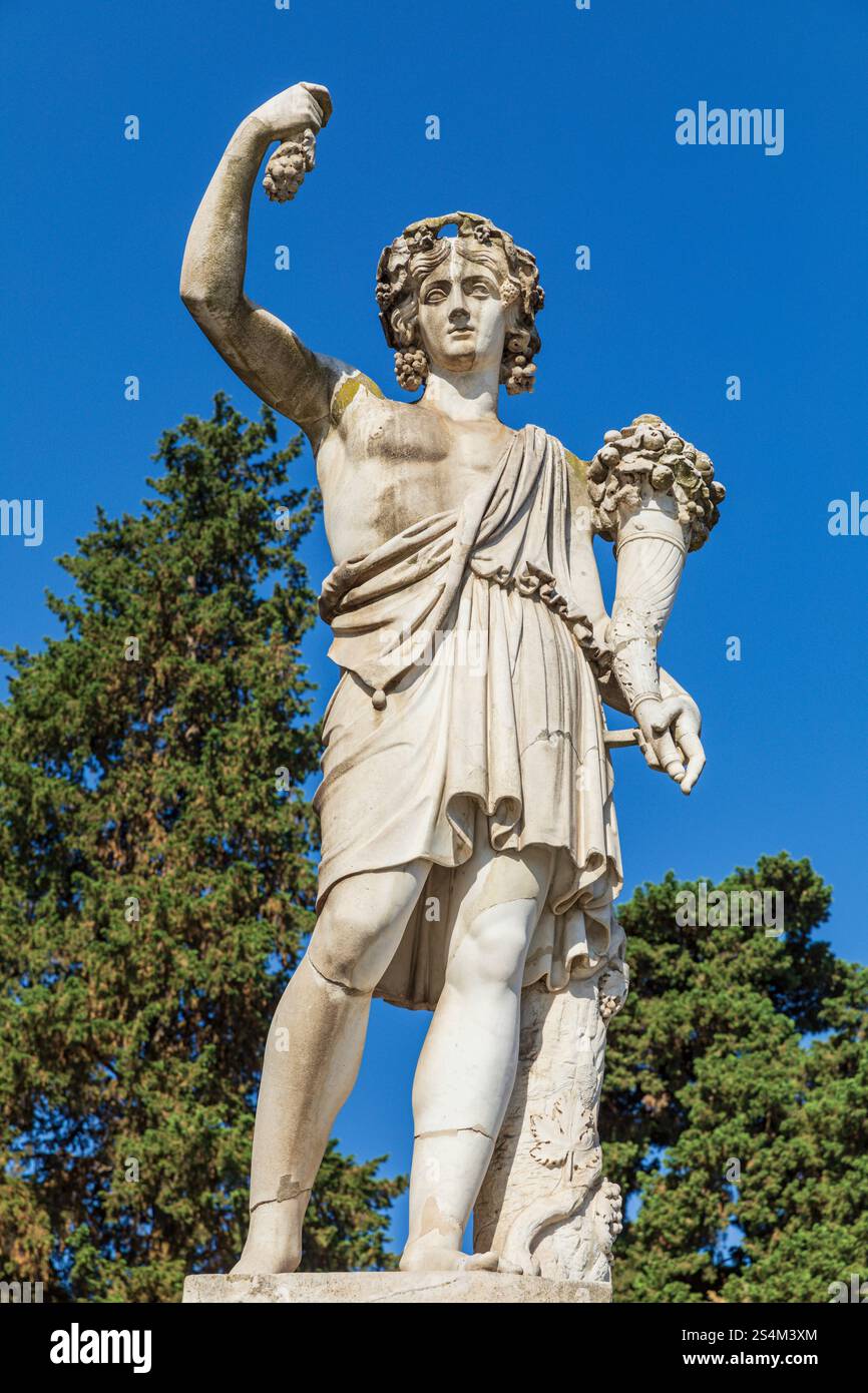 Statue of Bacchus with cornucopia in Piazza del Popolo, Rome, Italy ...