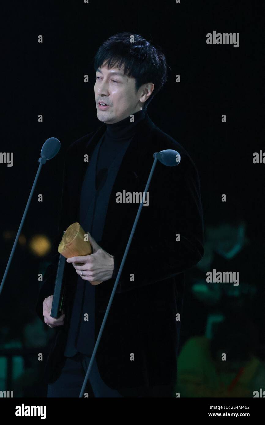 Chinese actor and director Zhang Luyi attends an activity in Macao ...
