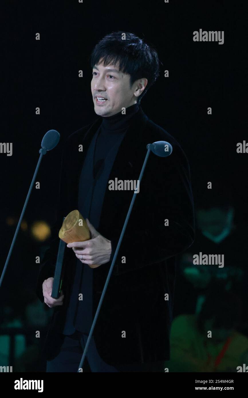 Chinese actor and director Zhang Luyi attends an activity in Macao ...