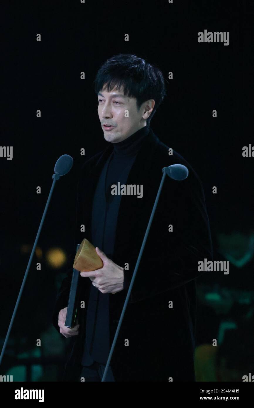 Chinese actor and director Zhang Luyi attends an activity in Macao ...