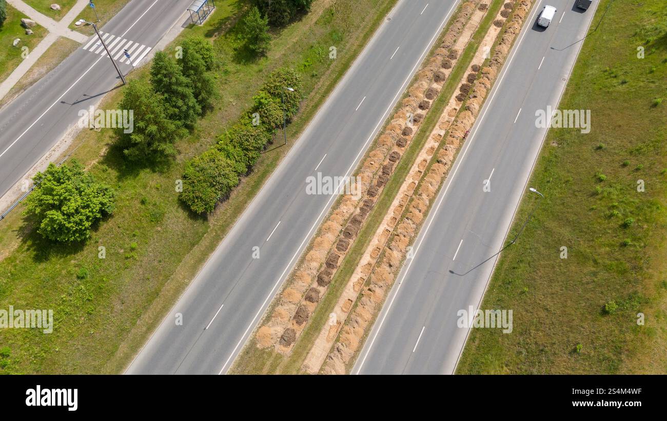 Aerial view of a divided highway with a central median under ...
