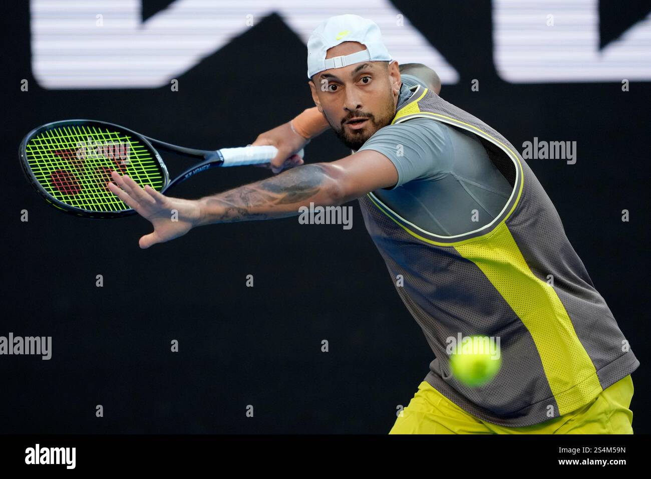Nick Kyrgios of Australia plays a forehand return to Jacob Fearnley of ...