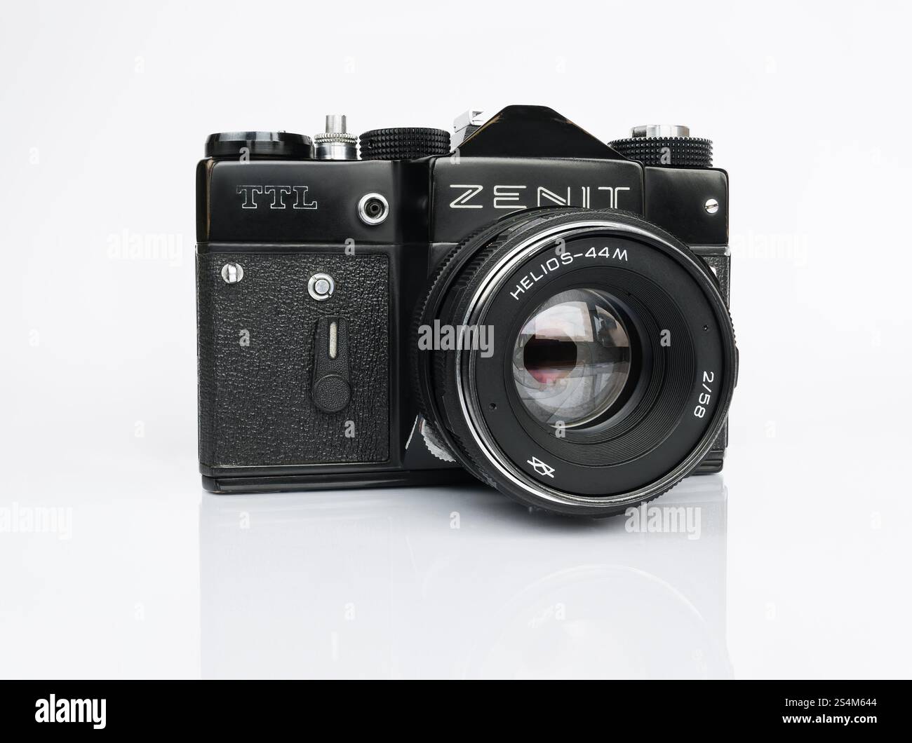 Soviet black film camera ZENIT TTL isolated on white background with ...