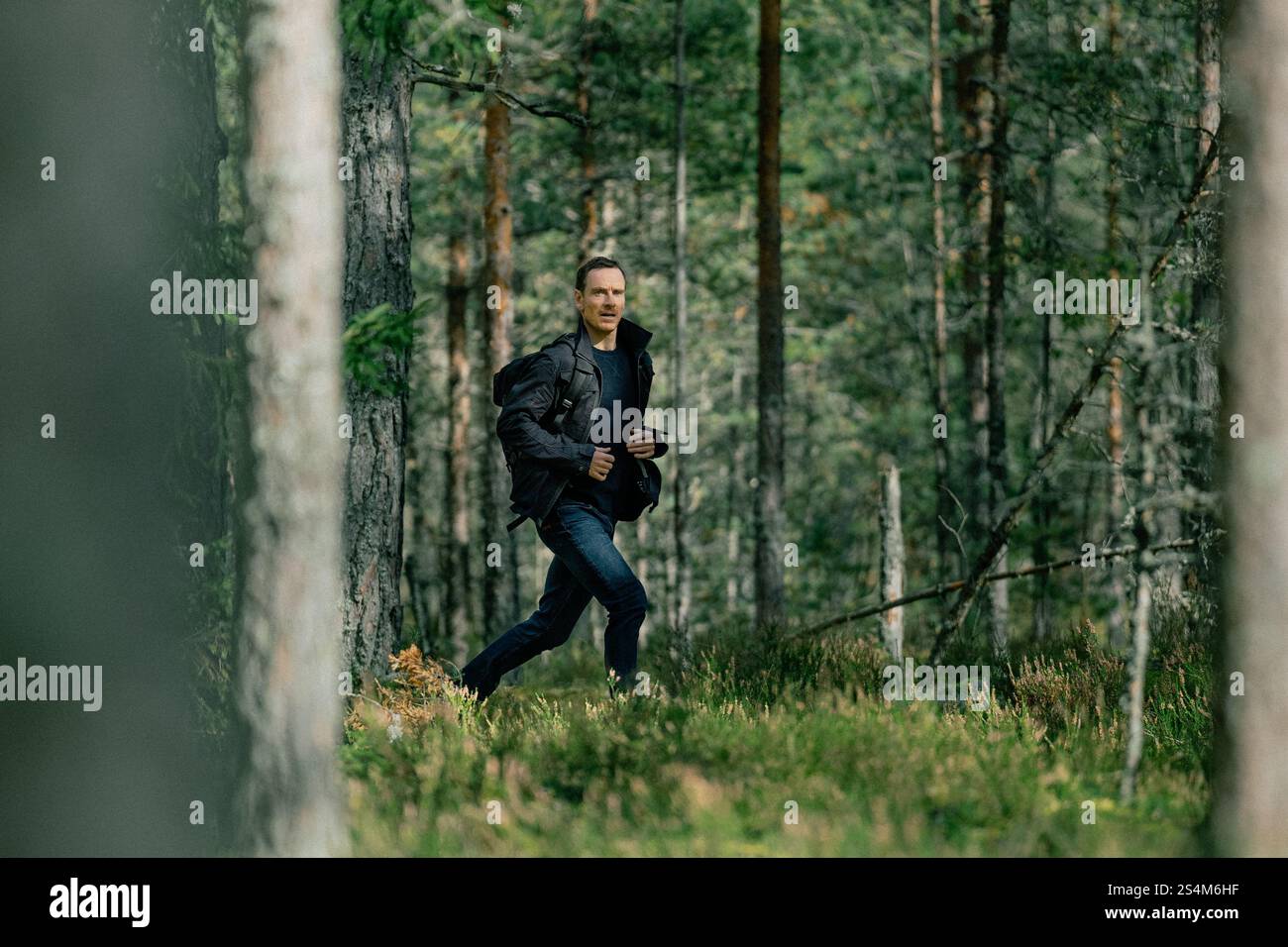 MICHAEL FASSBENDER in THE AGENCY (2024), directed by GRANT HESLOV, JOE ...