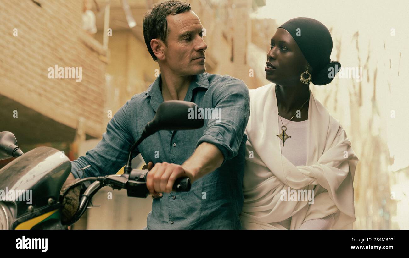 MICHAEL FASSBENDER and JODIE TURNER-SMITH in THE AGENCY (2024), directed by GRANT HESLOV, JOE ...