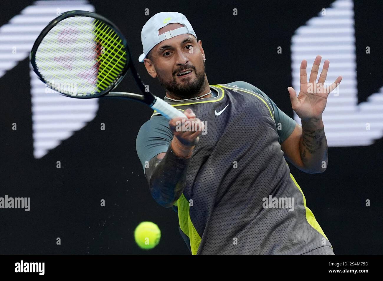 Nick Kyrgios of Australia plays a forehand return to Jacob Fearnley of ...
