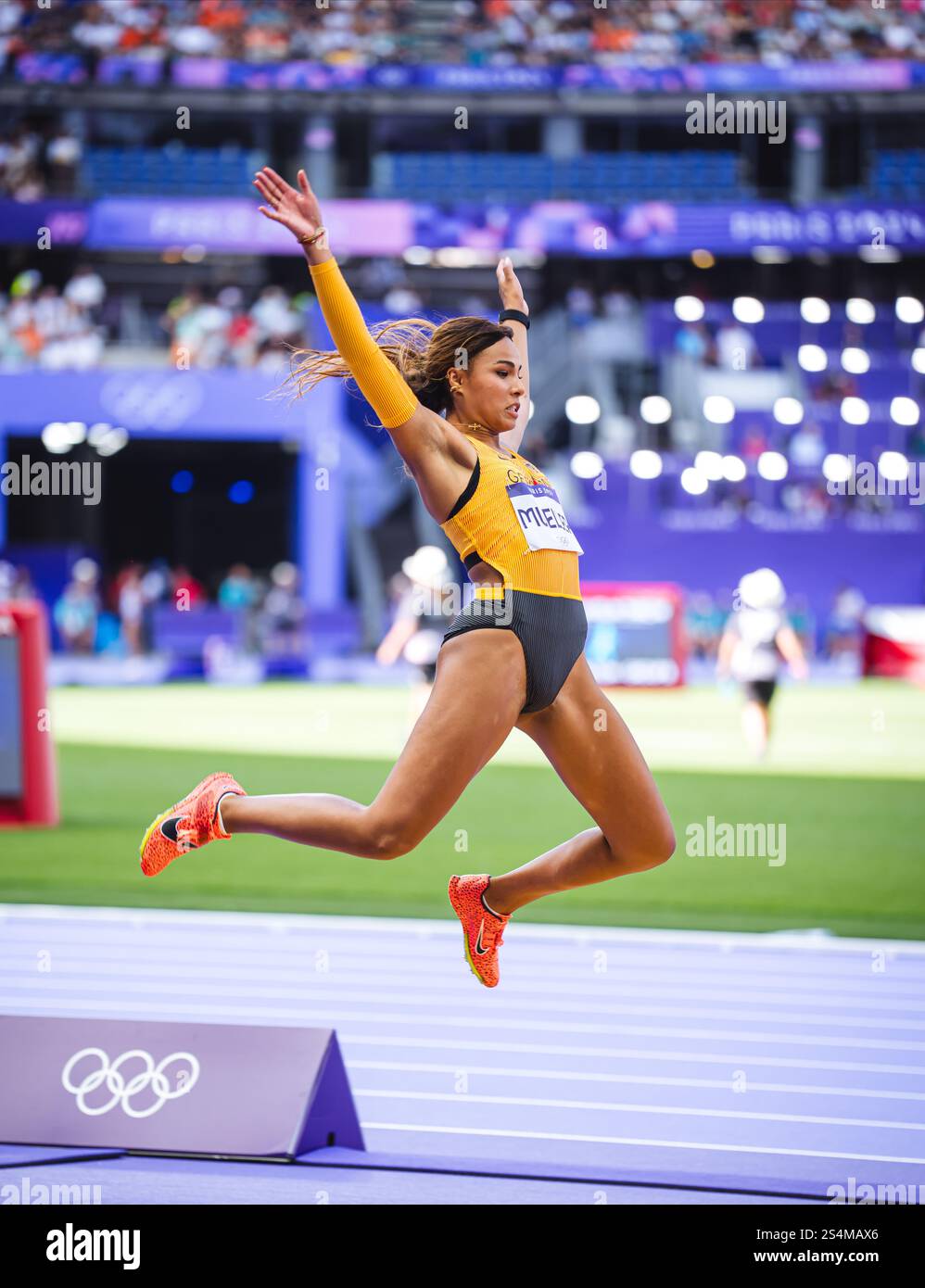 Mikaelle Assani participating in the long jump at the Paris 2024 ...