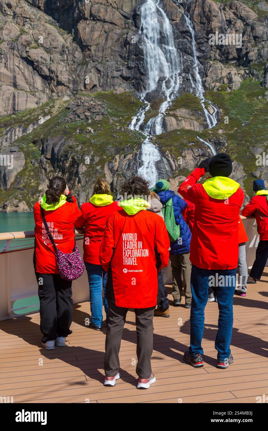 Tourists on deck of Hurtigruten MS Fridtjof Nansen cruise ship ...