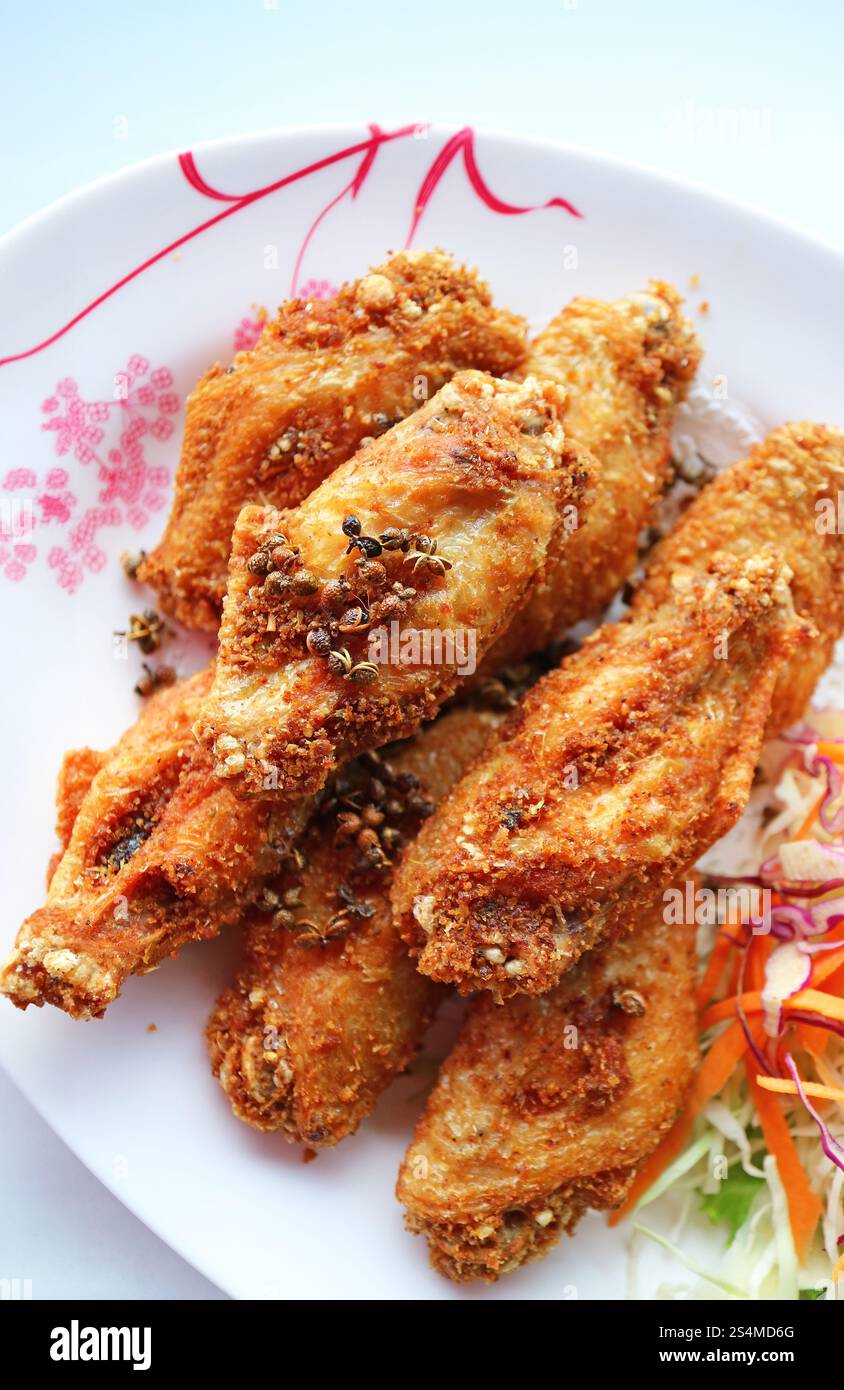 Thai Northern Style Deep Fried Chicken Wings with Spicy Rattan Pepper ...