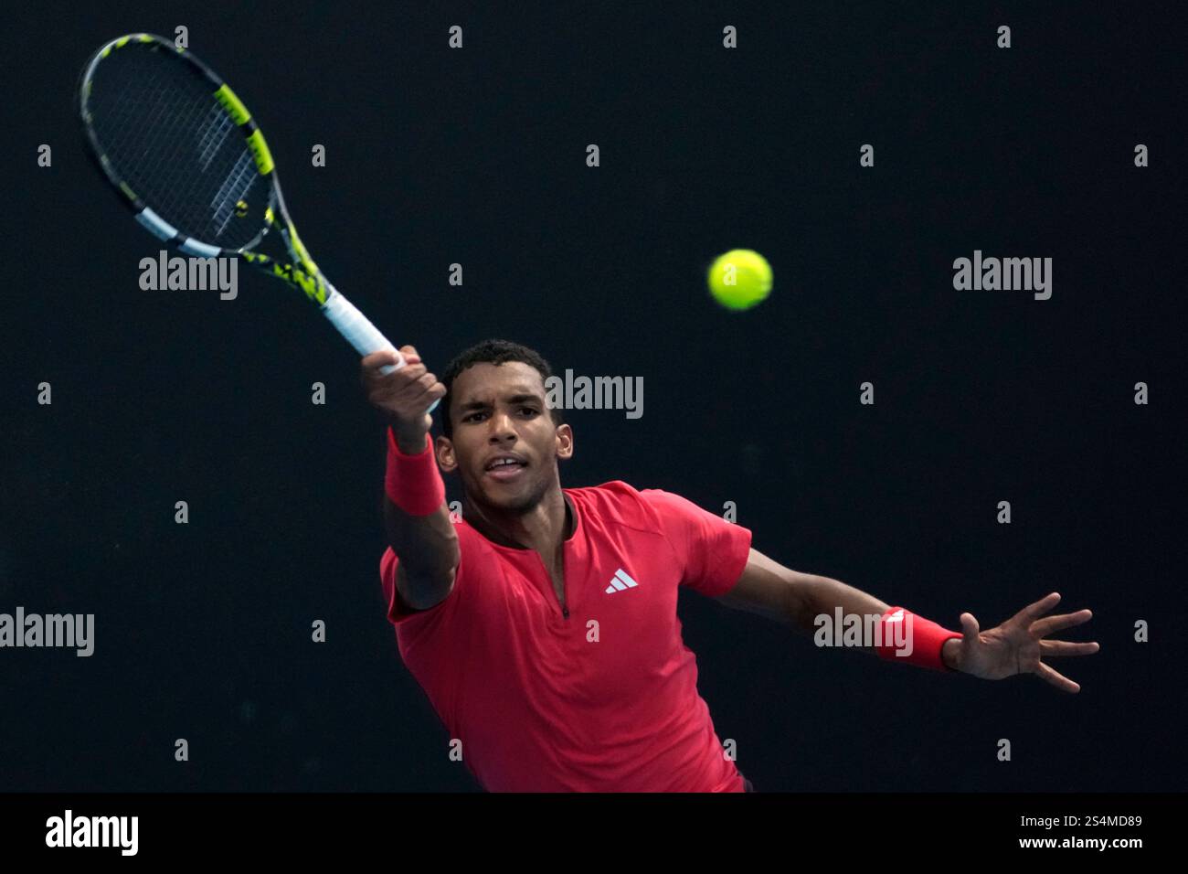 Felix Auger-Aliassime of Canada plays a forehand return to Jan-Lennard Struff of Germany during ...
