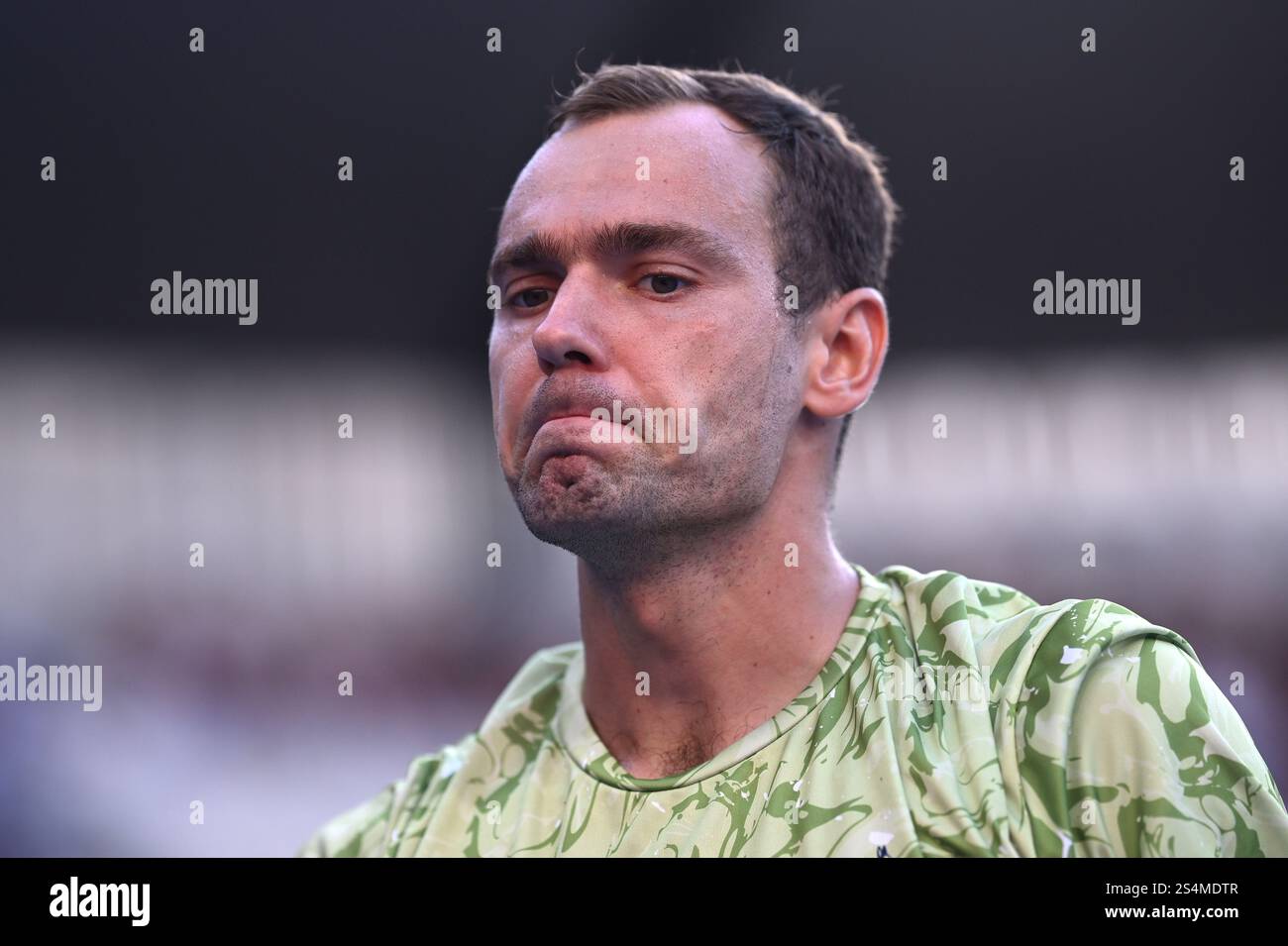 Melbourne, Australia. 13th Jan, 2025. Roman Safiullin of Russia during ...
